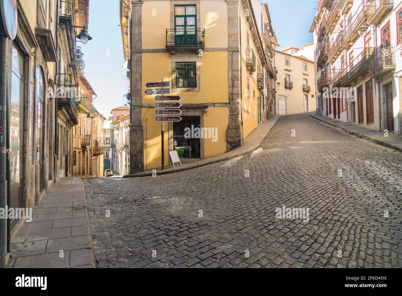 Portugal, Porto, Cobblestone alley and old apartment buildings Stock ...