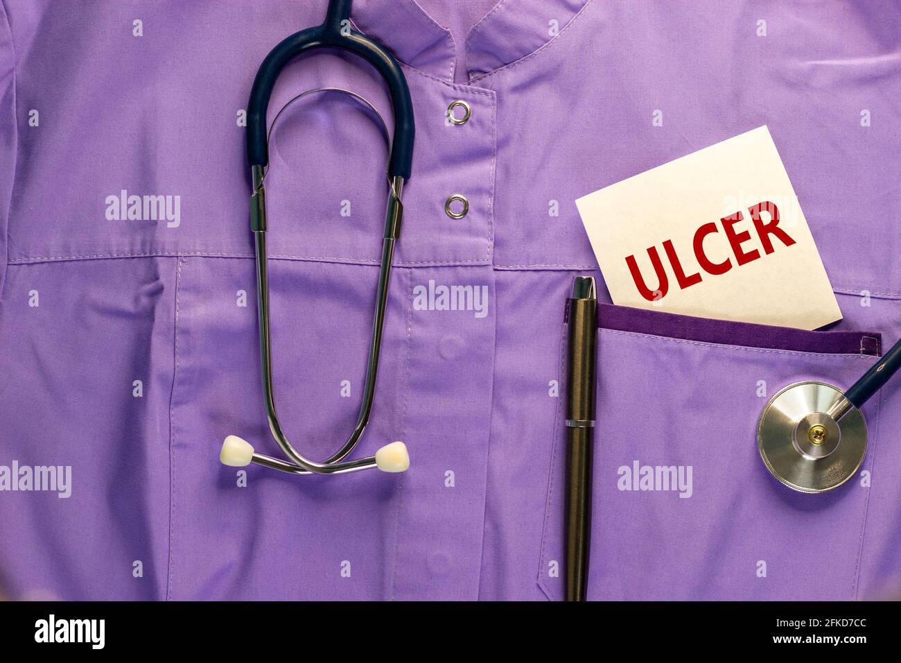 Stomach ulcer symbol. Medical uniform, white card with the word 'ulcer ...