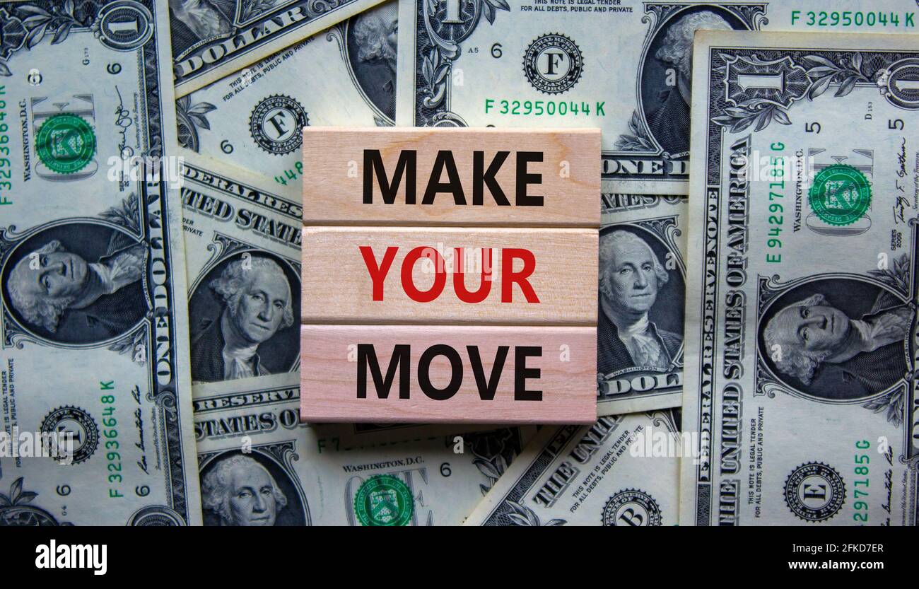 Make your move symbol. Wooden blocks with words 'Make your move ...