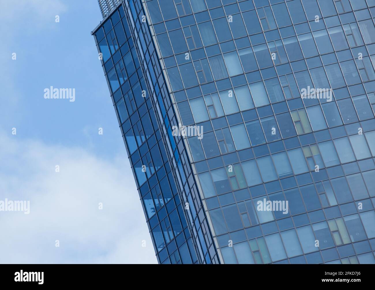 Steel light blue background of glass high rise building skyscraper ...