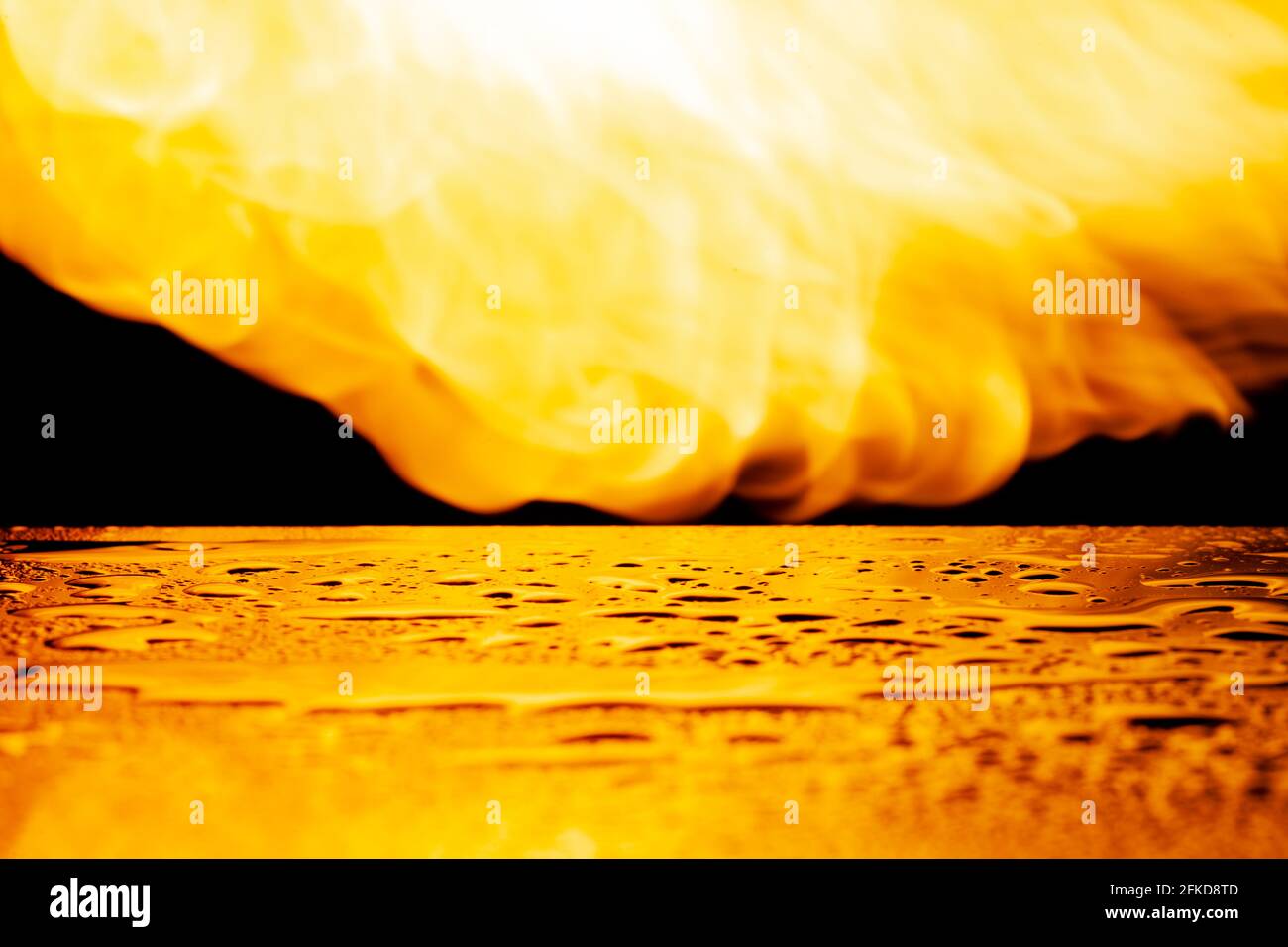 Fire on the water. Isolation on a black background Stock Photo - Alamy