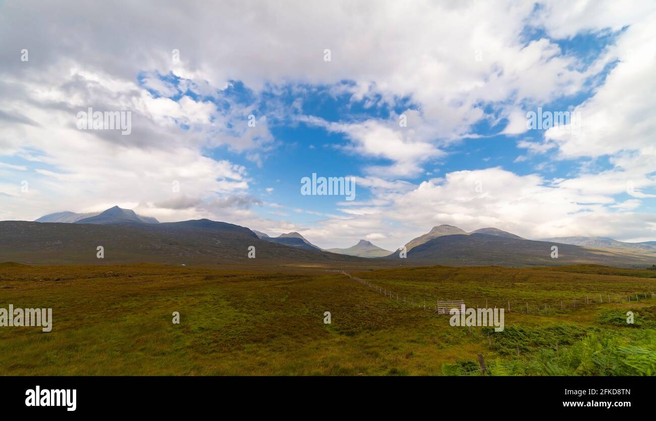 A stop sign with a mountain in the background Stock Photo - Alamy