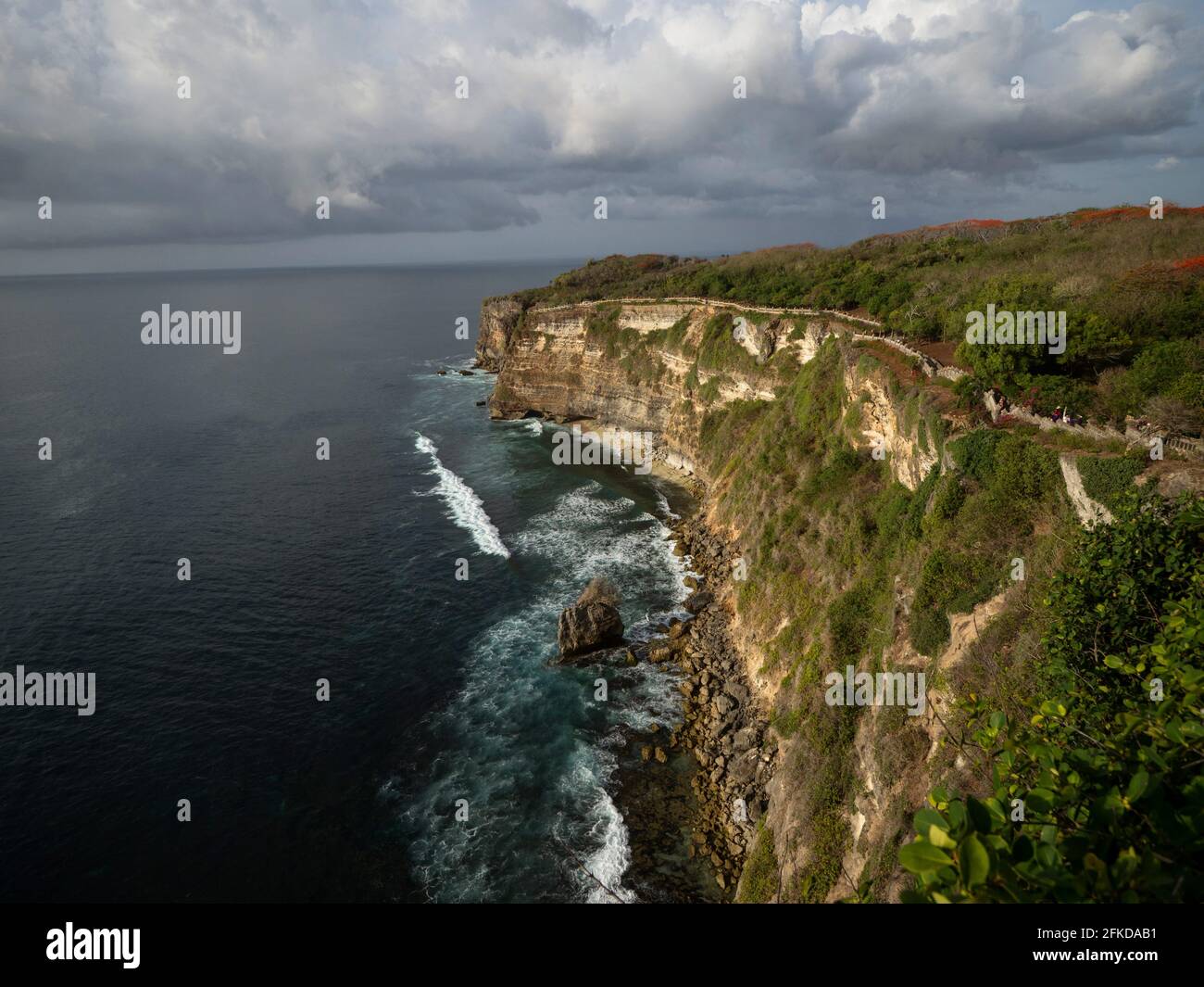 Seascape panorama view of steep rock cliff coast landscape at Uluwatu ...