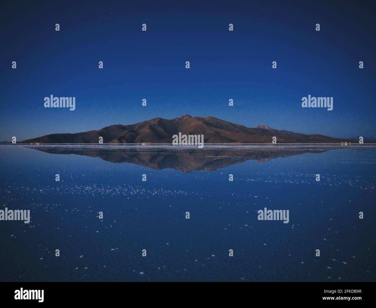 Andes mountains sunrise panorama mirror reflection on Salar de Uyuni ...