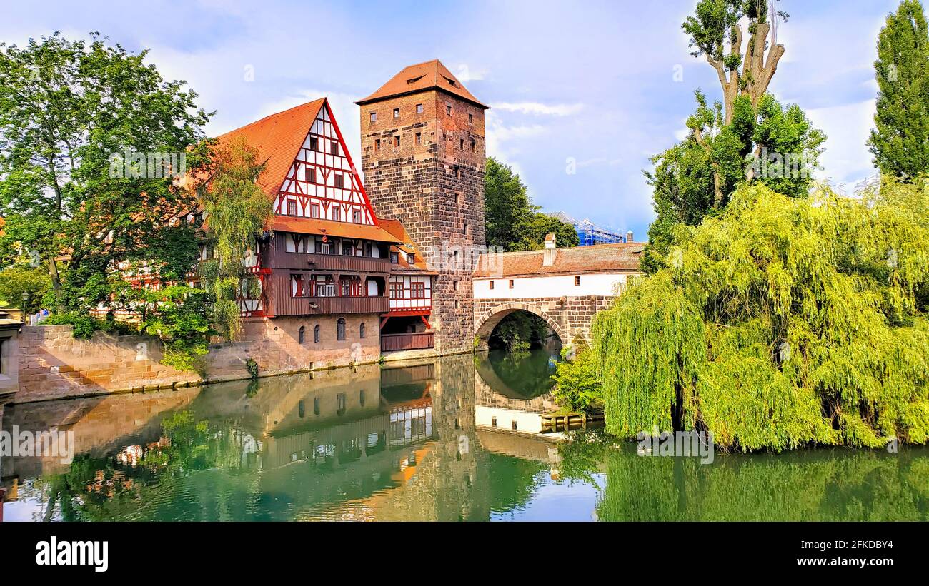 Nuremberg, Germany, beautiful old bridge with medieval tower and half ...