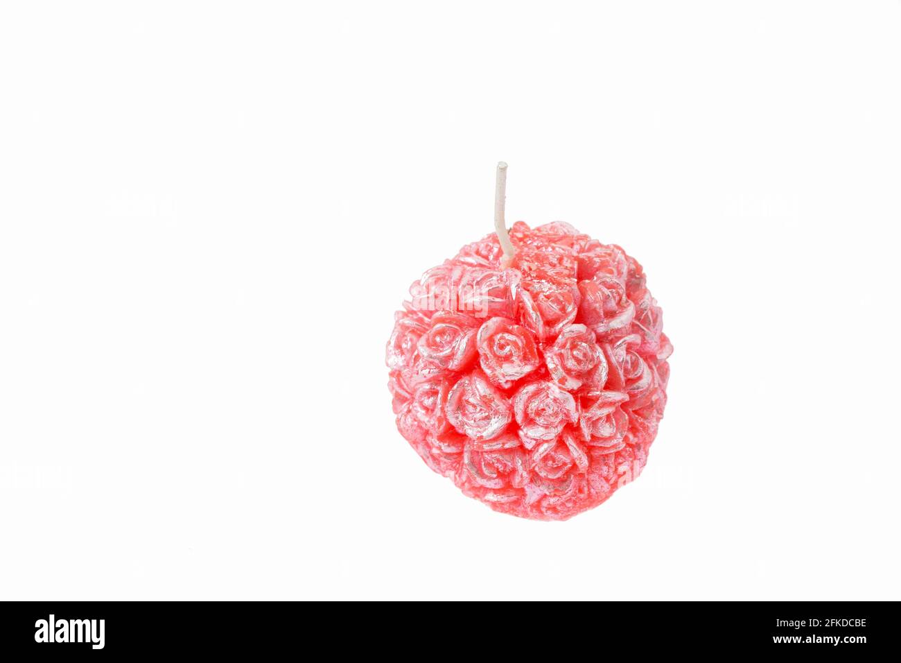 Textured red sphere wax candle - White background Stock Photo - Alamy