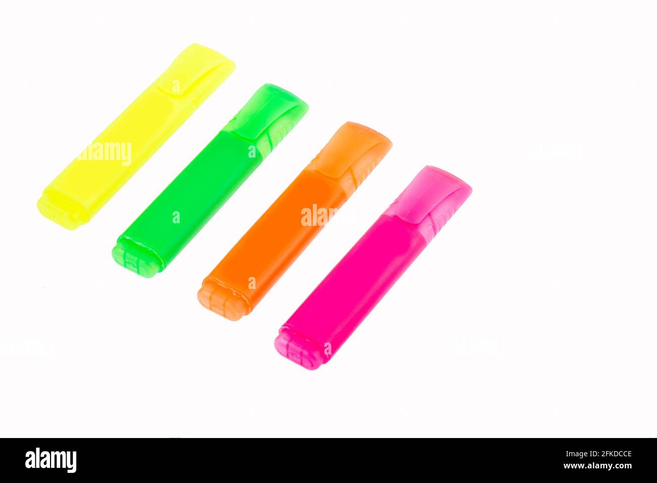 Highlighters in four colors isolated white background Stock Photo - Alamy