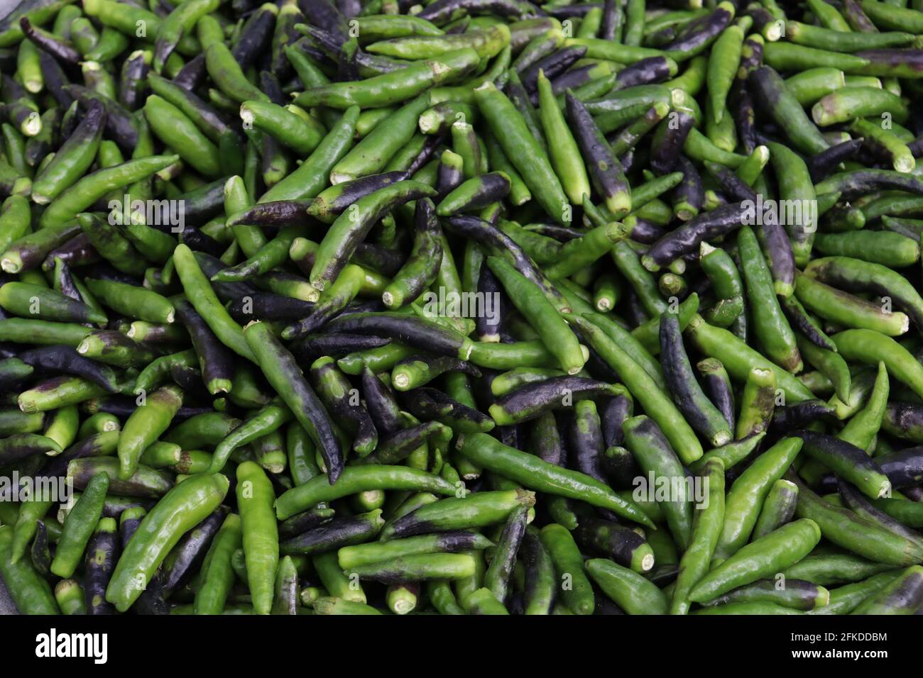 hot and spicy green raw chili stock on shop Stock Photo - Alamy