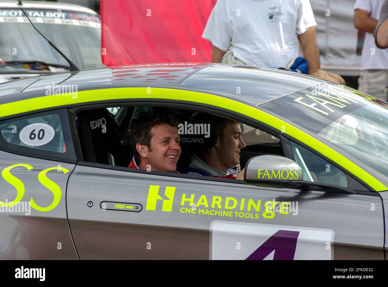 Rally driver Mark Higgins at the wheel of an Aston Martin Vantage rally ...