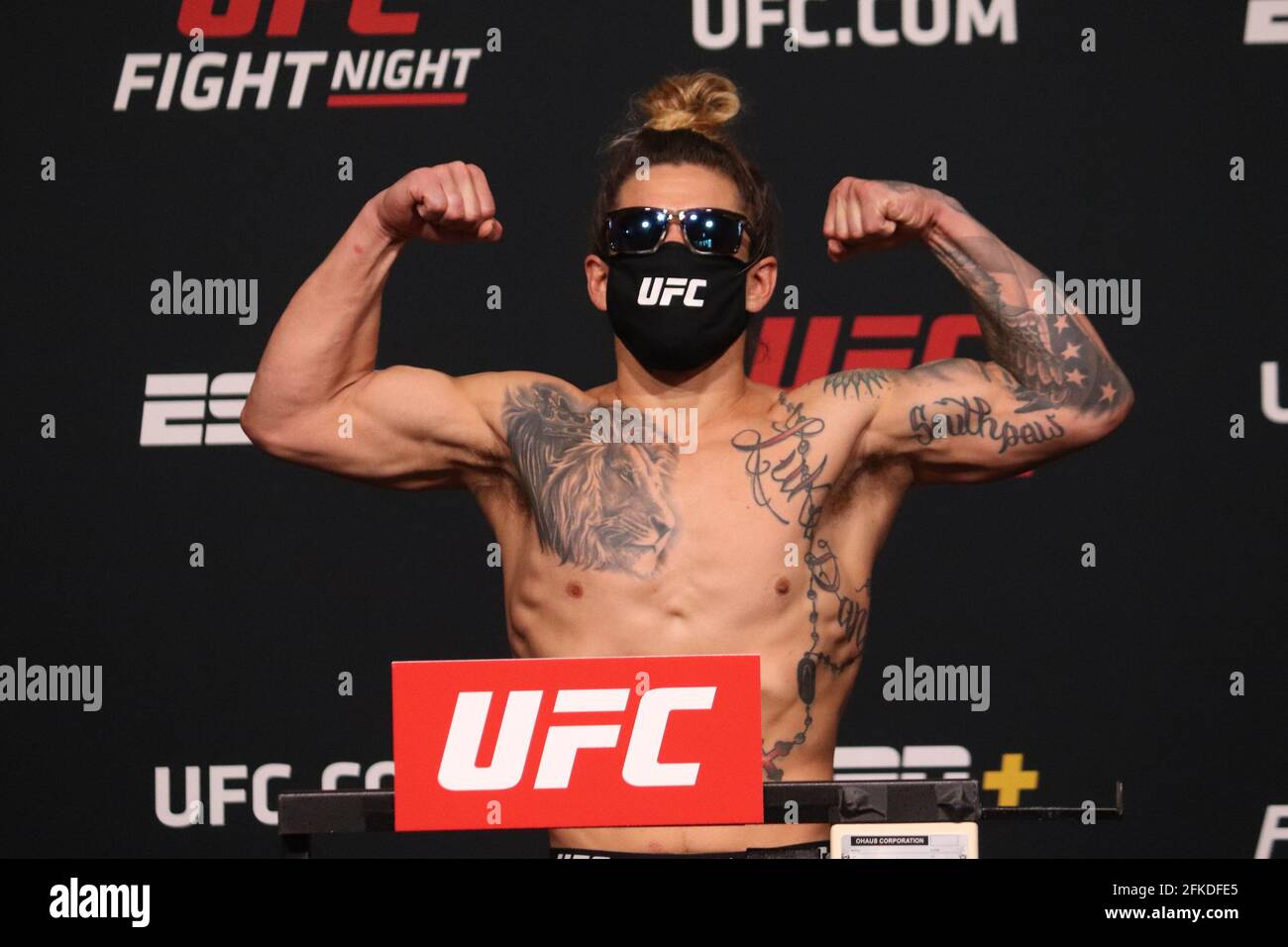 Las Vegas, Nevada, USA. 30th Apr, 2021. Luke Sanders poses on the scale ...