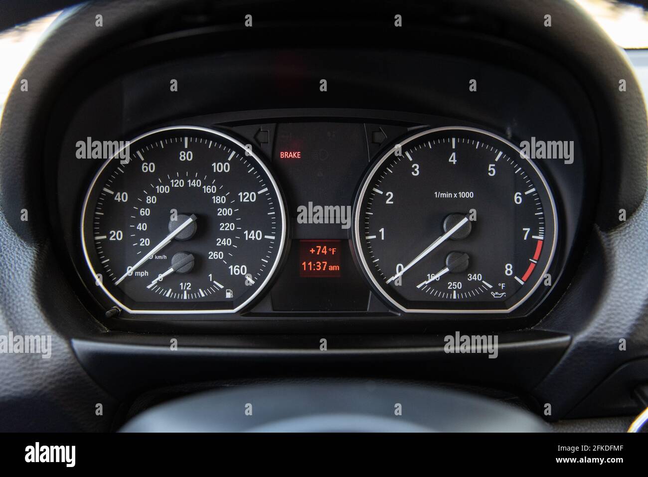 Speedometer and odometer readout for driver of luxury car with ...