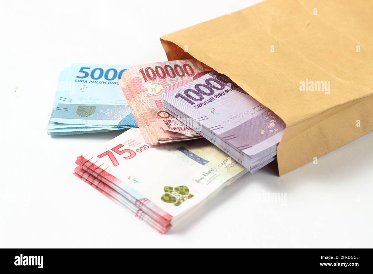 Random Layout Photo Rupiah Paper Money, 10000, 50000, 100000 and 75000 ...