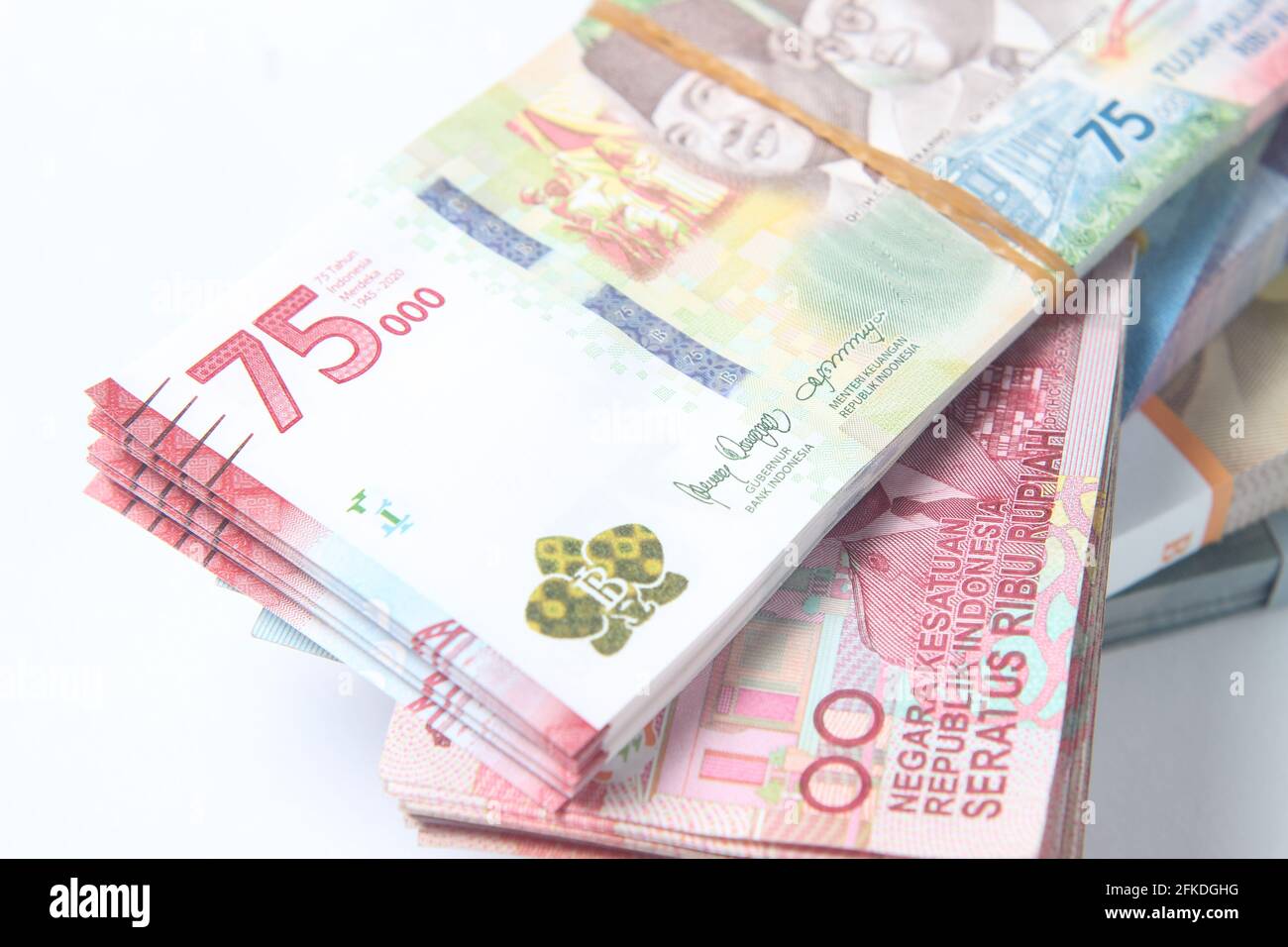 Random Layout Photo Rupiah Paper Money, 10000, 50000, 100000 and 75000 ...