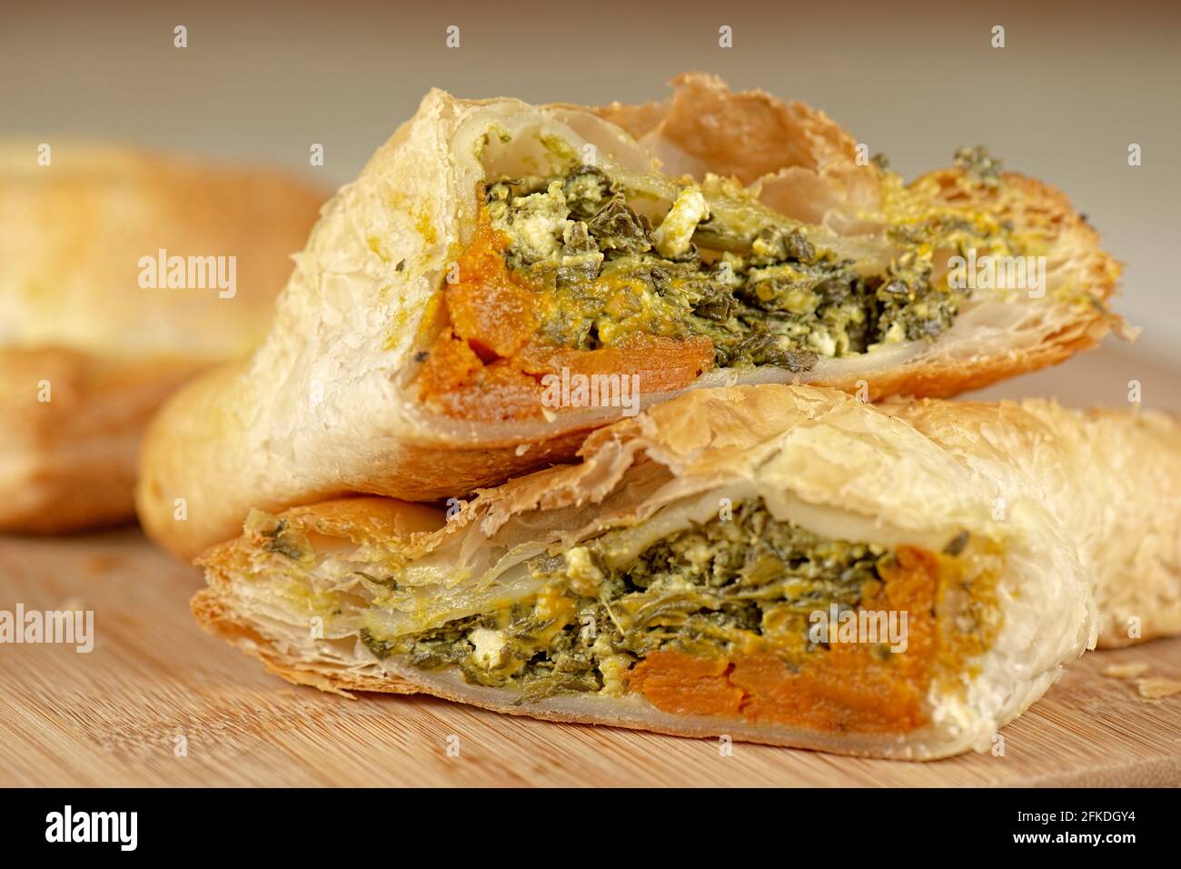 Freshly baked spinach triangle pastry with danish feta and roaster ...