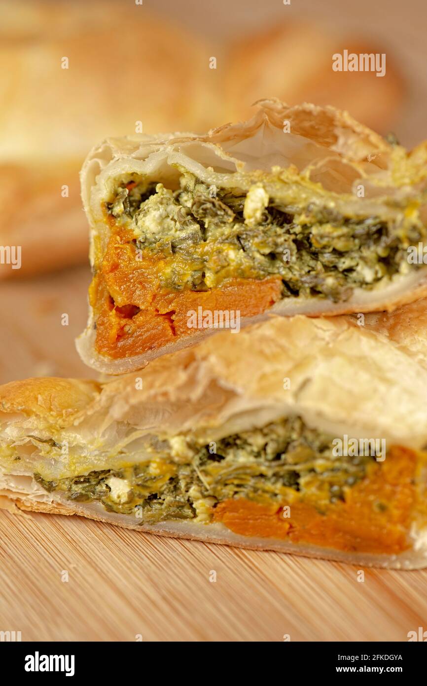 Freshly baked spinach triangle pastry with danish feta and roaster ...