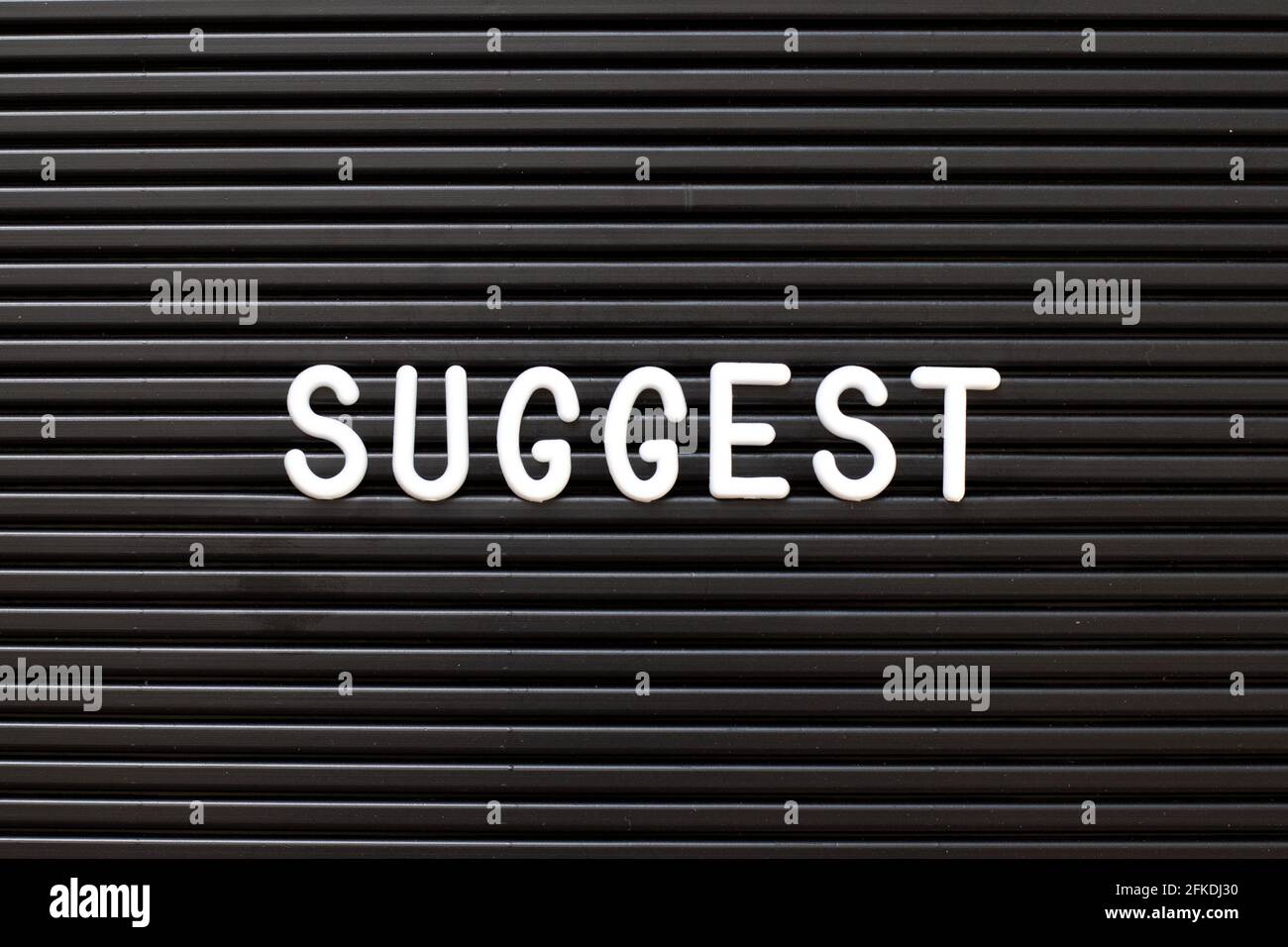 Black color felt letter board with white alphabet in word suggest ...