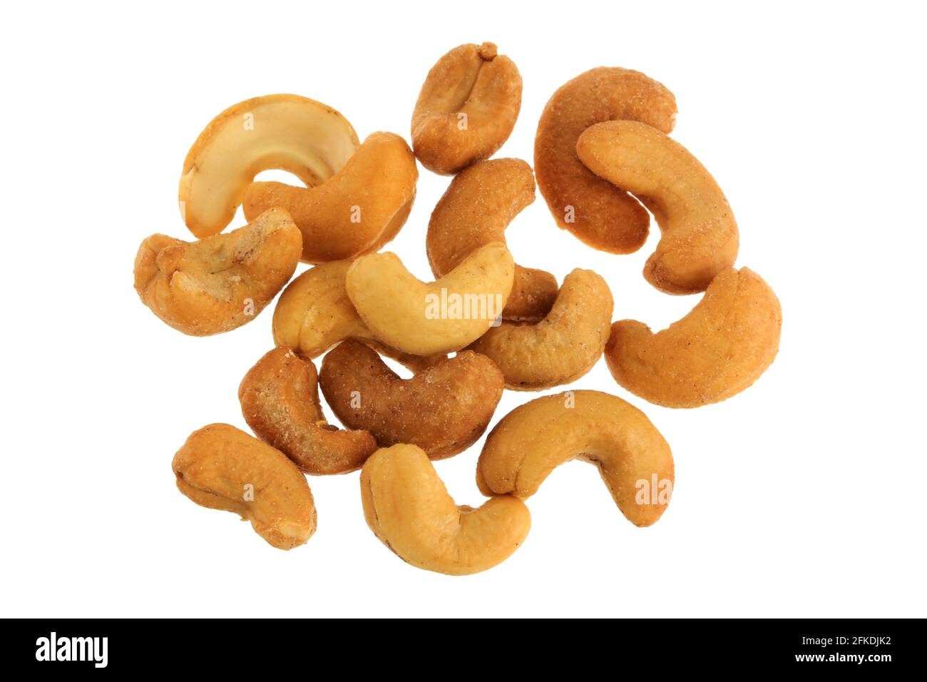 Roasted salted cashew nuts with salt isolated on white background Stock ...