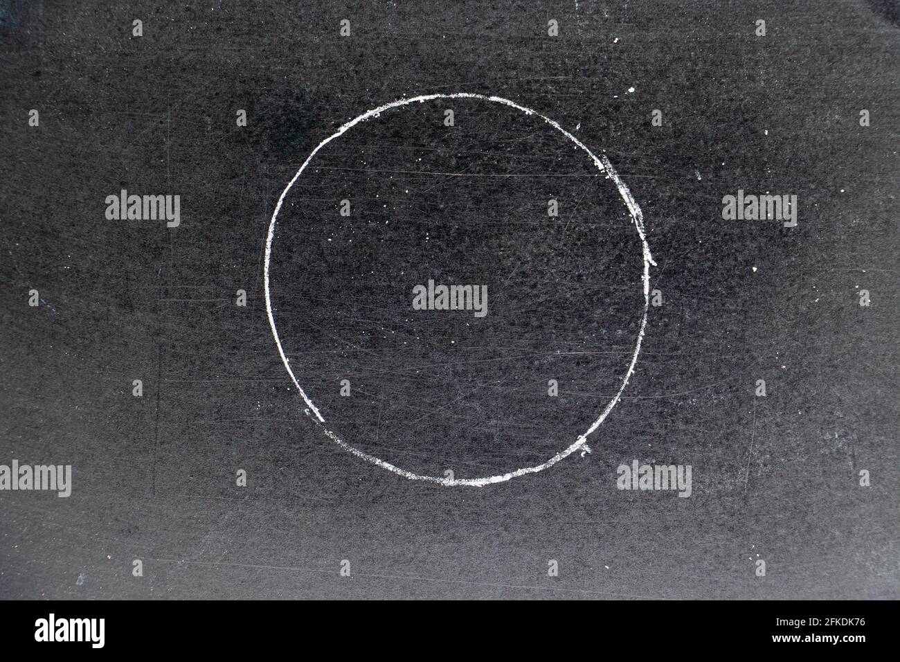 White chalk drawing as circle shape on black board background Stock ...