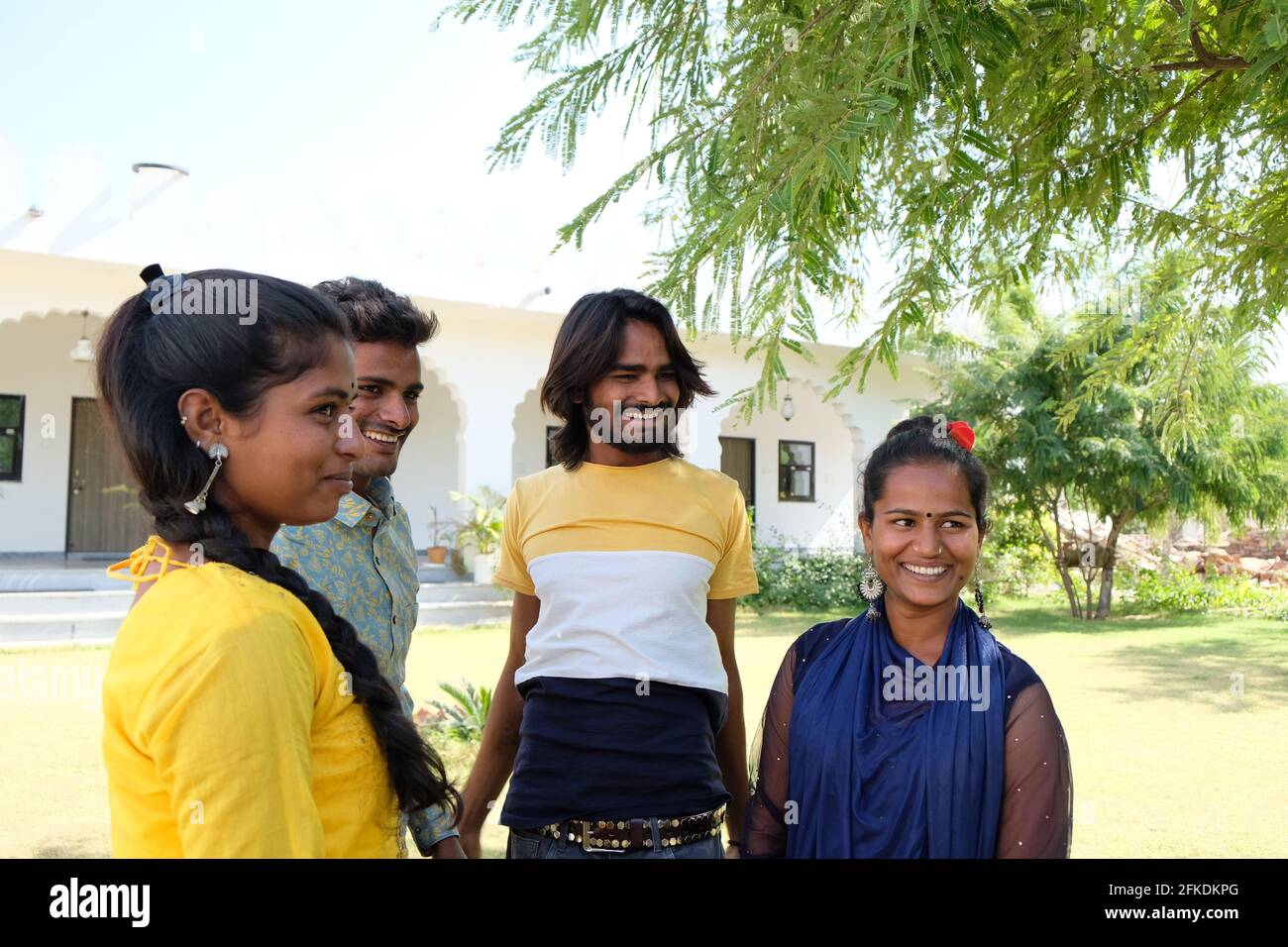 Group of happy smiling young Indian friends enjoying their time ...