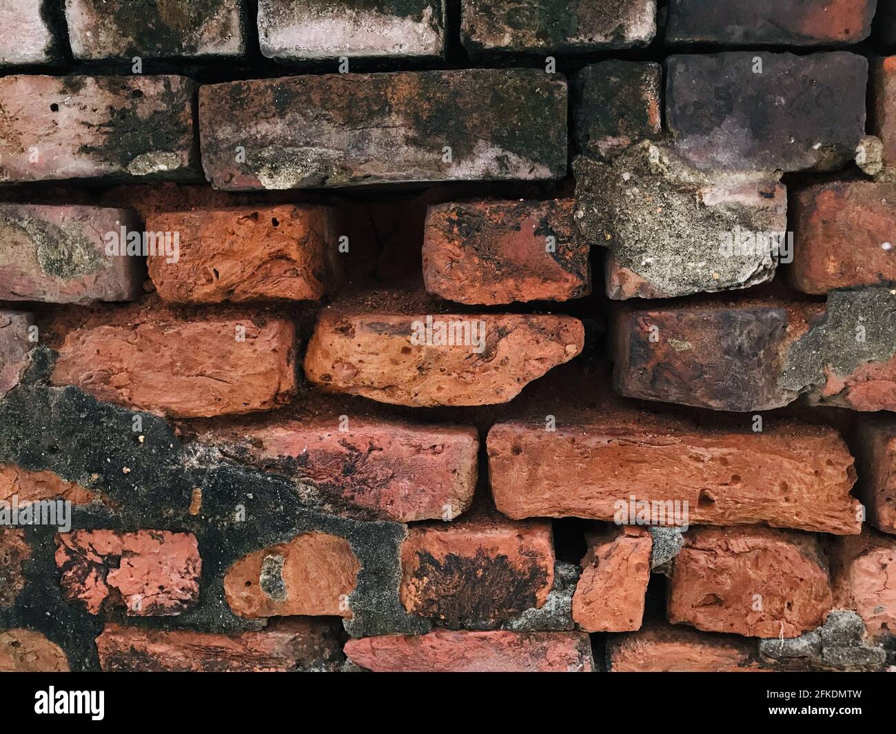 Old moldy red brick wall for background Stock Photo - Alamy