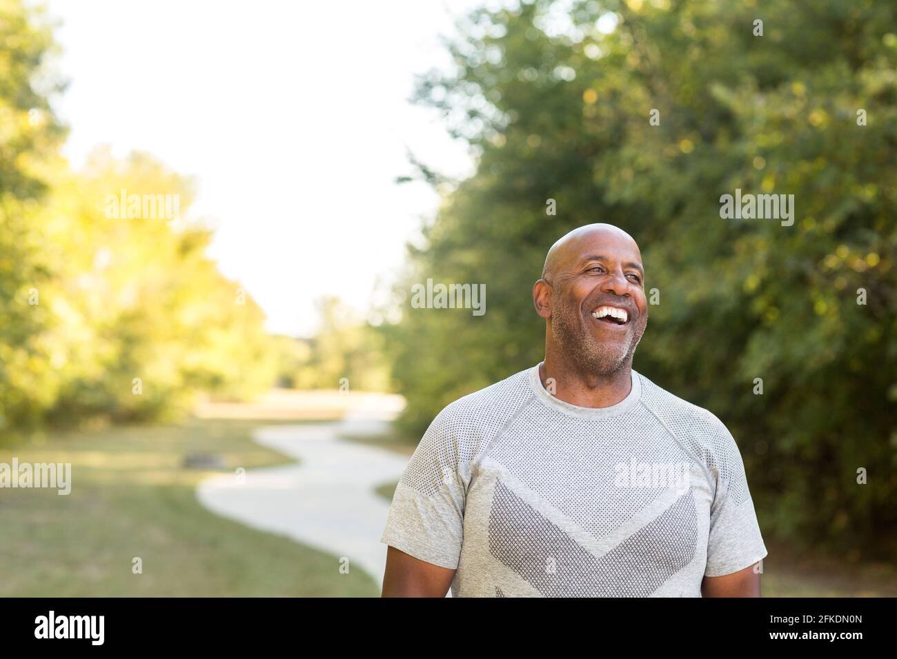 Mature African American man taking a walk outside Stock Photo - Alamy