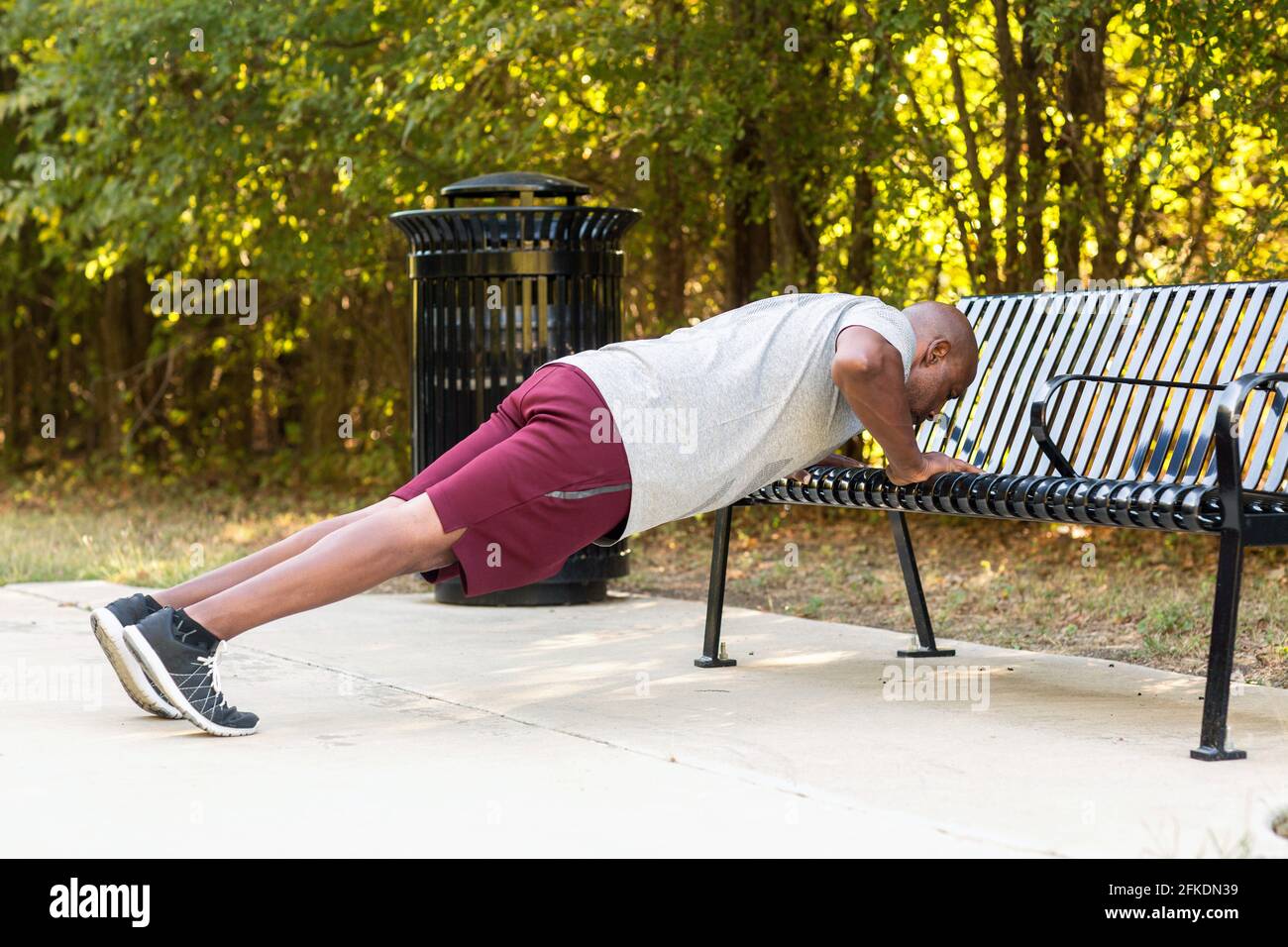 Mature African American working out and doing push ups Stock Photo - Alamy