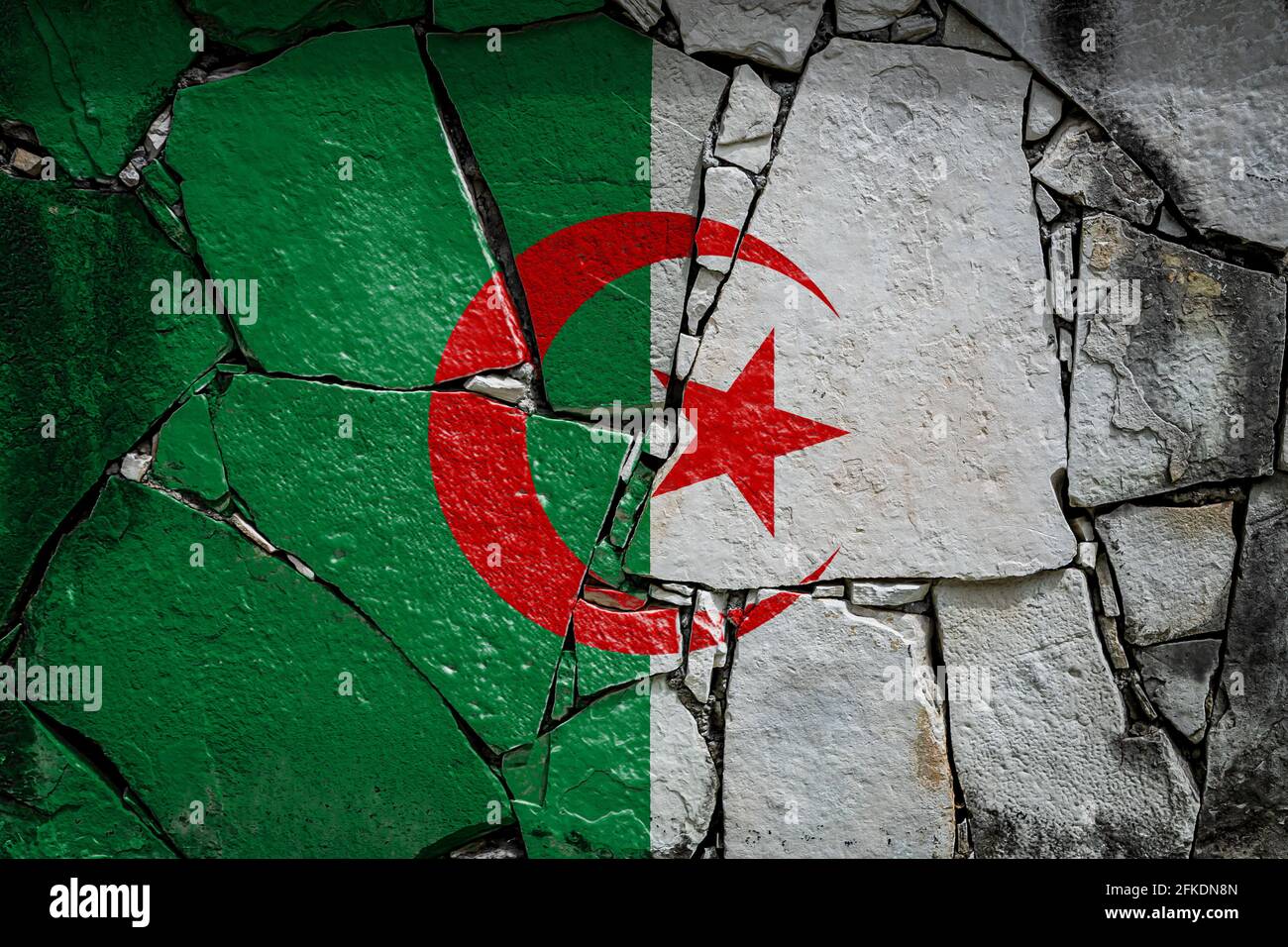 National flag of Algeria depicting in paint colors on an old stone wall ...