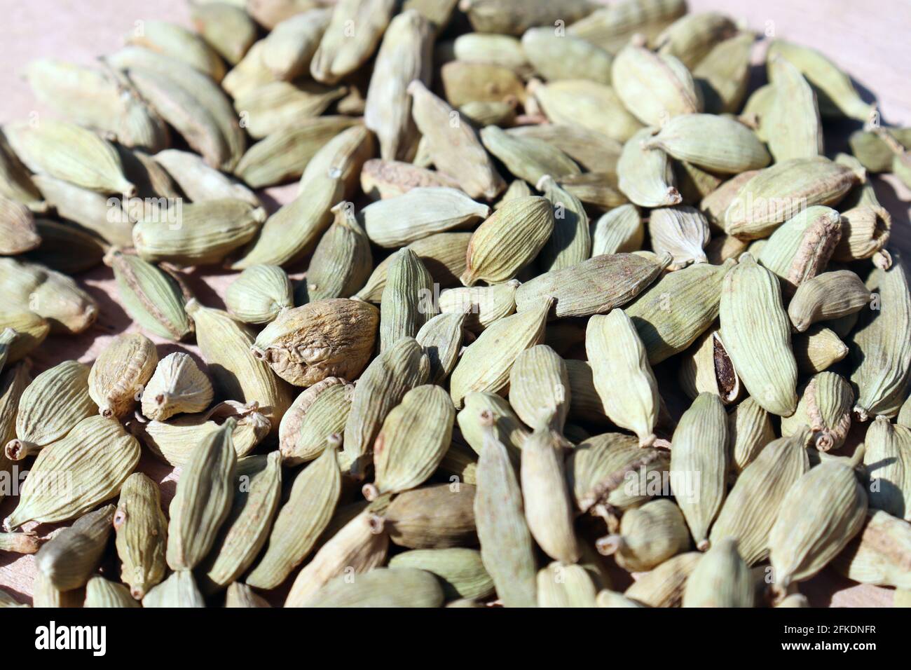 healthy and spicy Black Cardamom stock background Stock Photo - Alamy