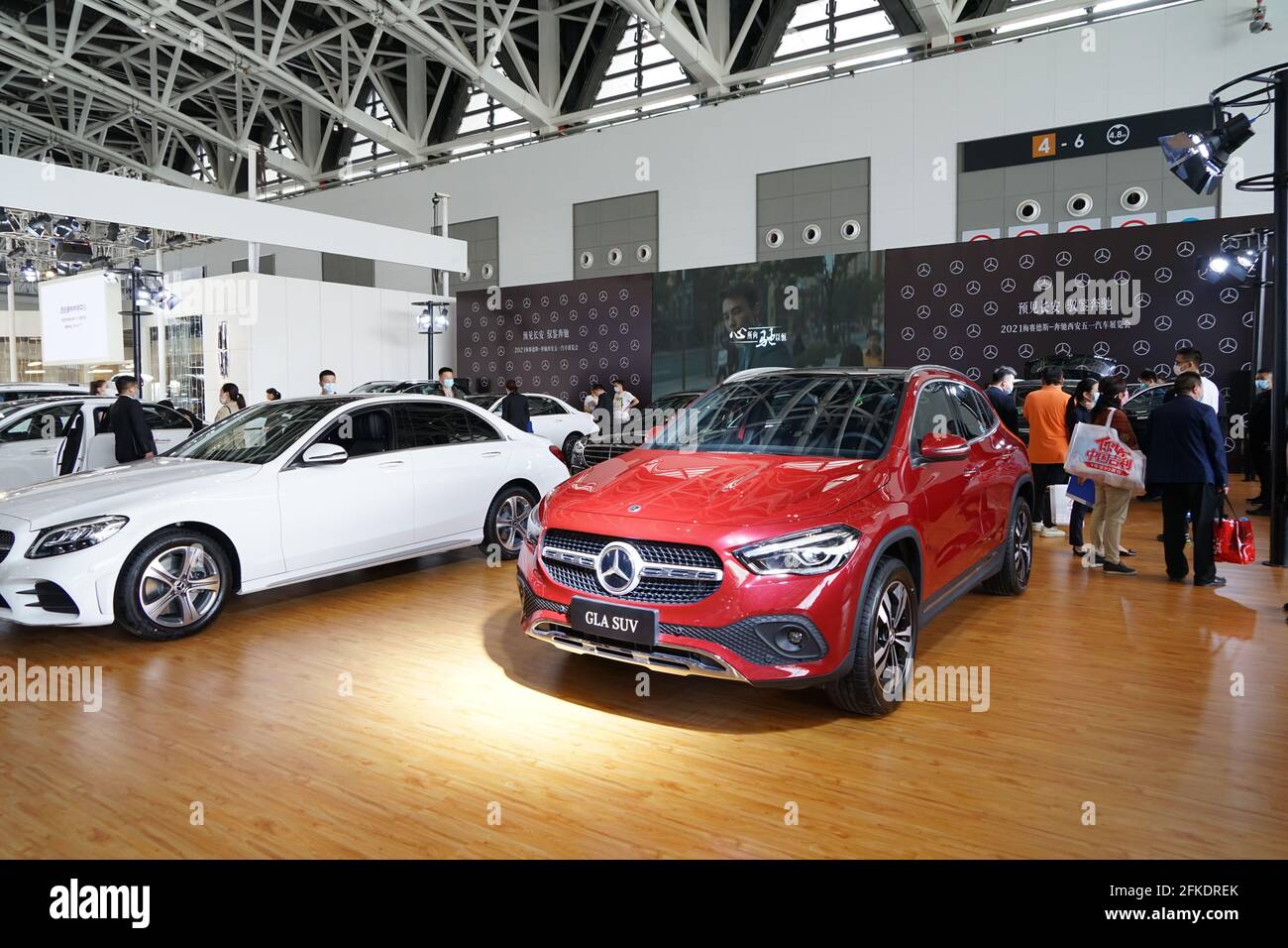 XI'AN, CHINA - APRIL 30, 2021 - Visitors look at a new Mercedes-Benz ...