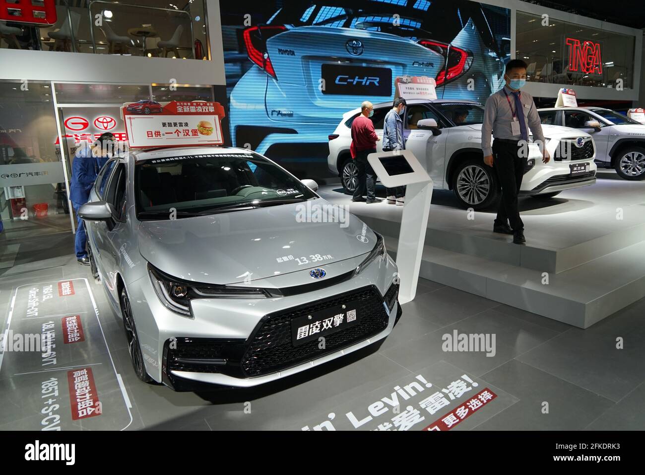 XI'AN, CHINA - APRIL 30, 2021 - Visitors look at new cars at the Xi 'an ...