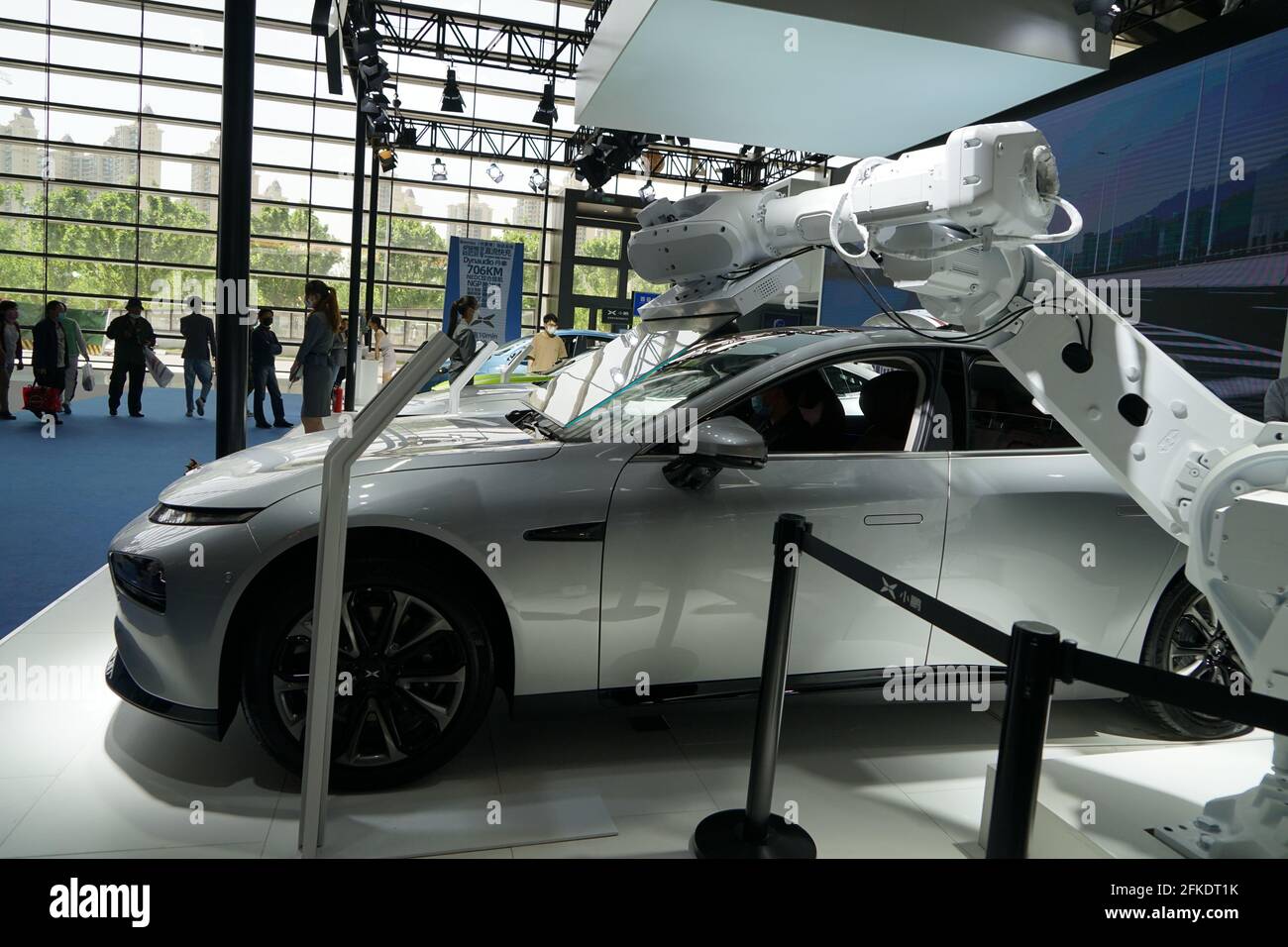 XI'AN, CHINA - APRIL 30, 2021 - Visitors look at new cars at the Xi 'an ...