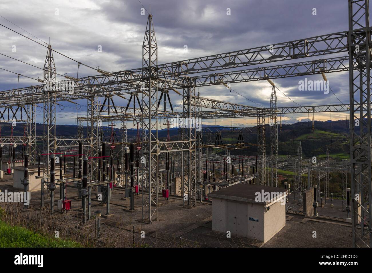 Electrical substation against the beautiful scenic view of clouds Stock ...