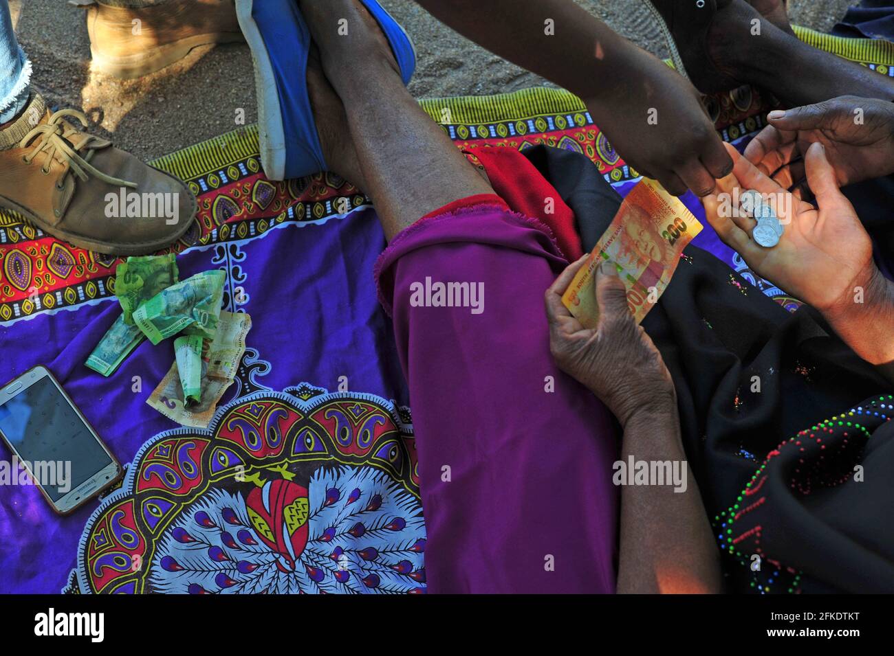 Salt harvesters working at the ancient Baleni Salt Works in Limpopo ...