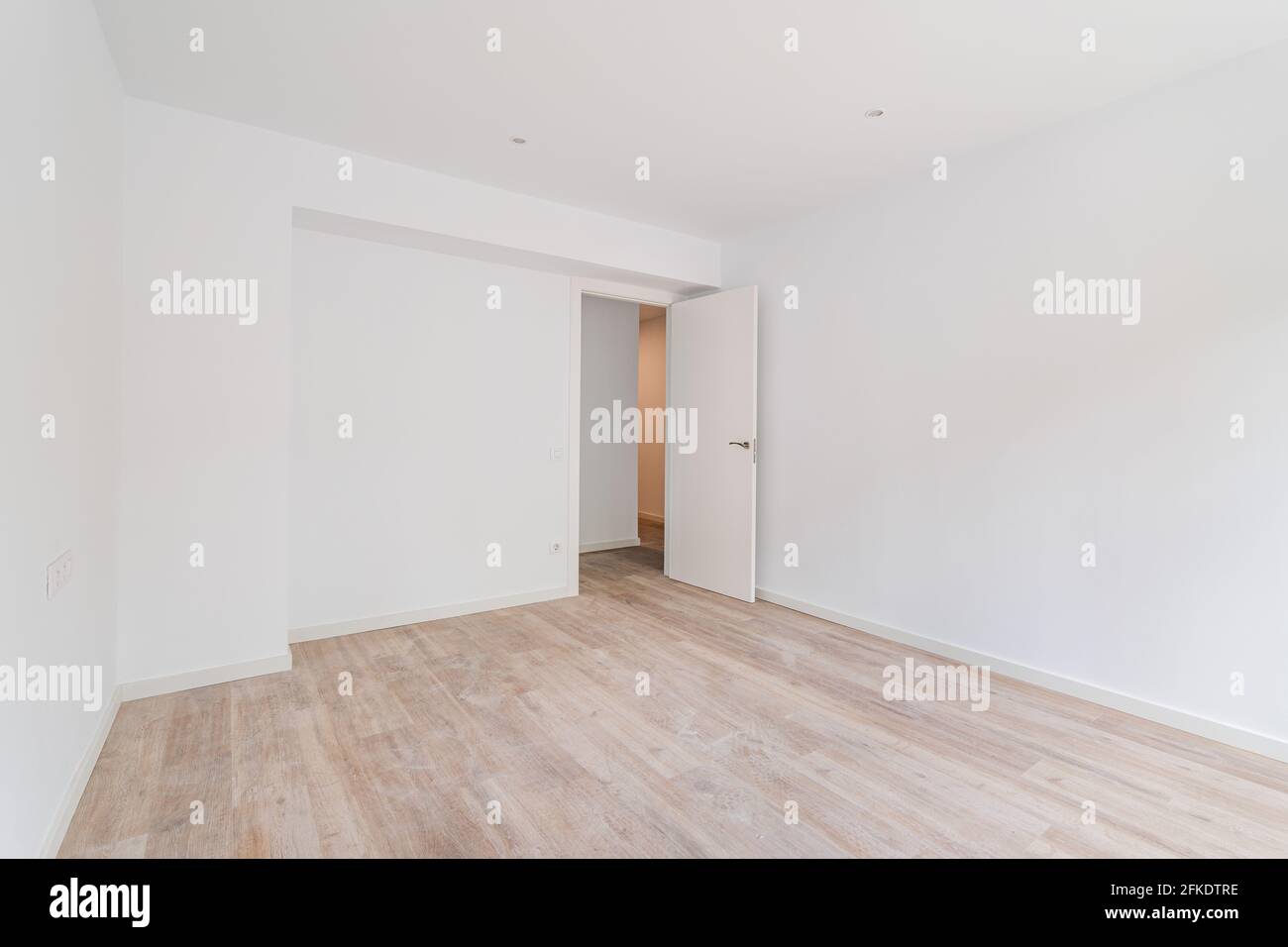 Empty white room after renovation with dusty wooden floor Stock Photo ...
