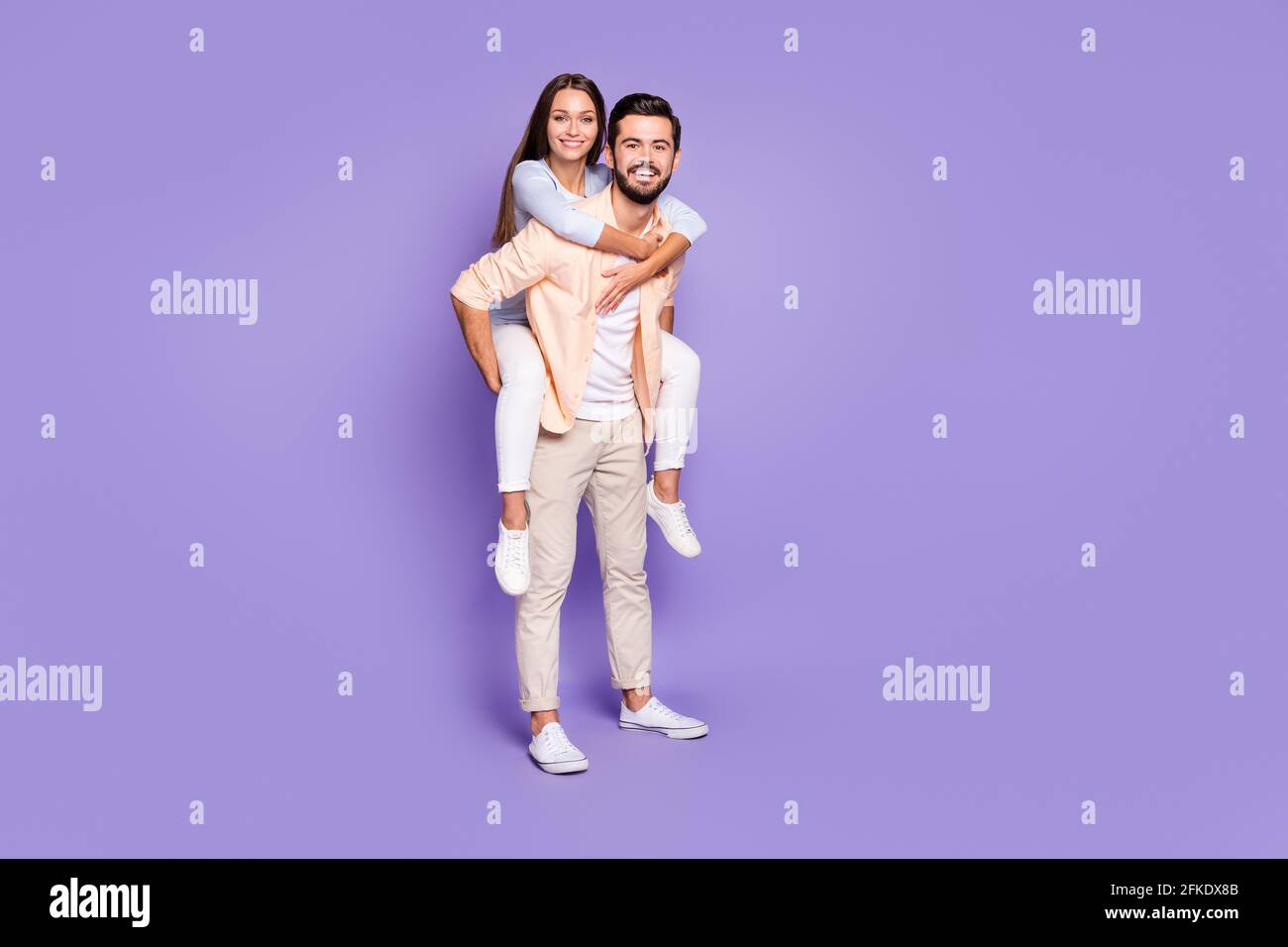 Full size profile photo of carefree people man piggyback lady look ...
