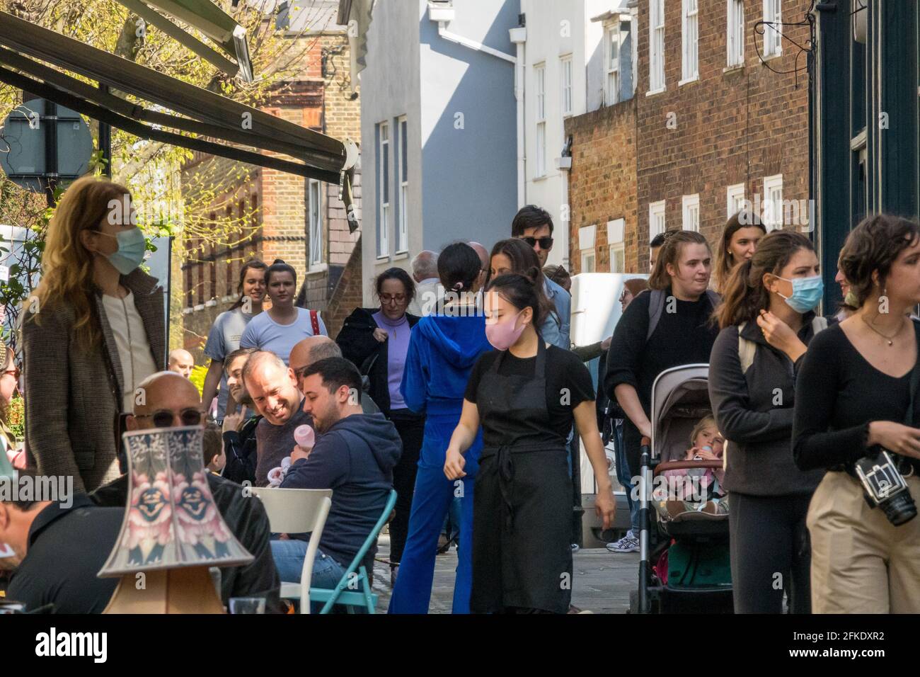 A busy pedestrian street, Flask Walk, in Hampstead. London, U.K Stock ...