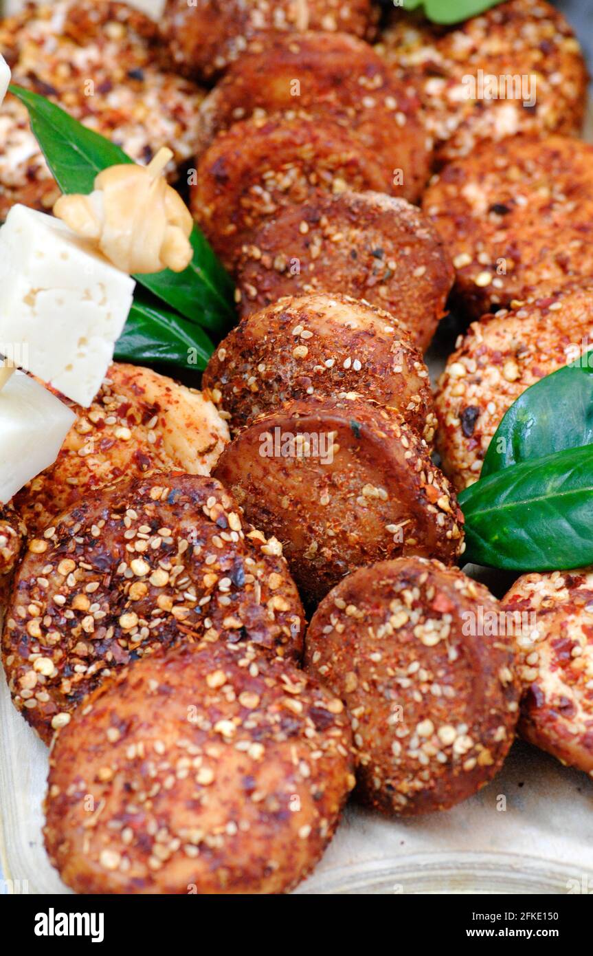 Tomini cheese from Piemonte region whit hot pepper from Calabria Stock ...