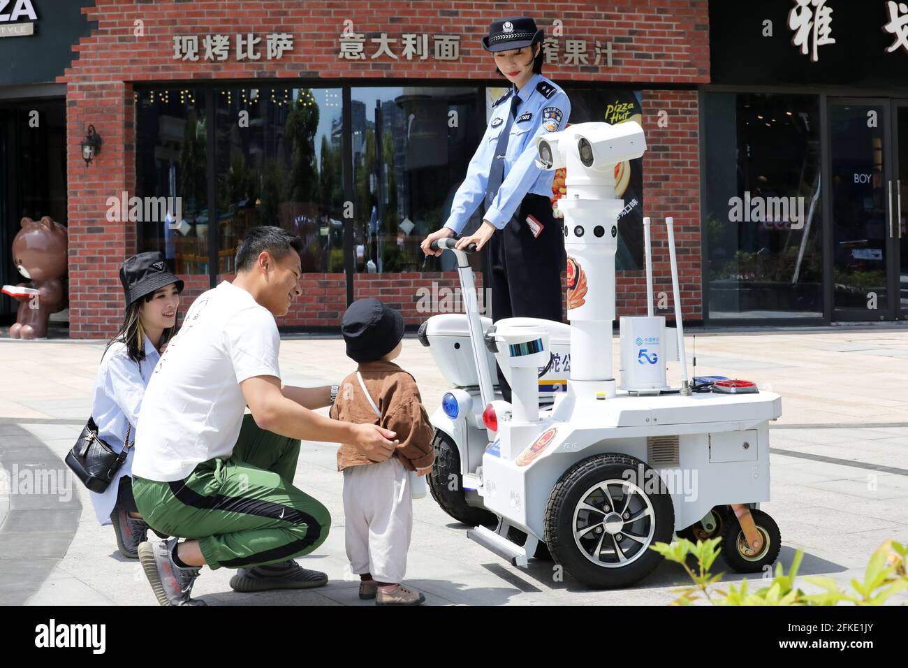 ZHOUSHAN, CHINA - MAY 1, 2021 - A 5G-equipped police robot patrols at ...