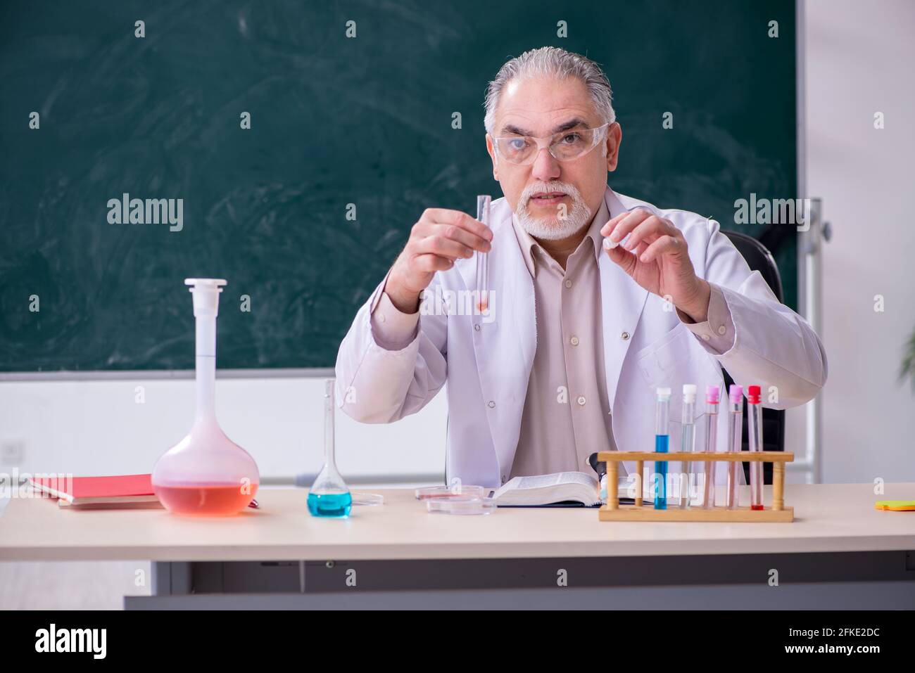Experienced old scientist working in the laboratory Stock Photo - Alamy