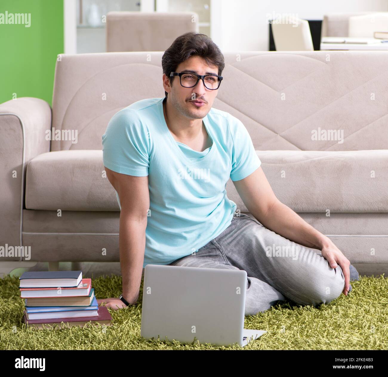 The student preparing for university exams at home Stock Photo - Alamy