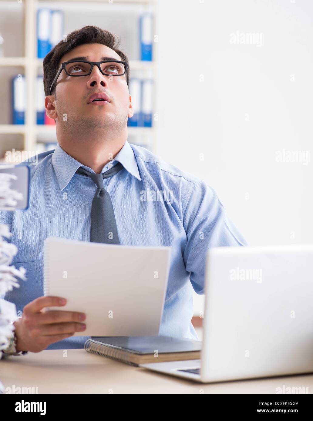 The extremely busy businessman working in office Stock Photo - Alamy