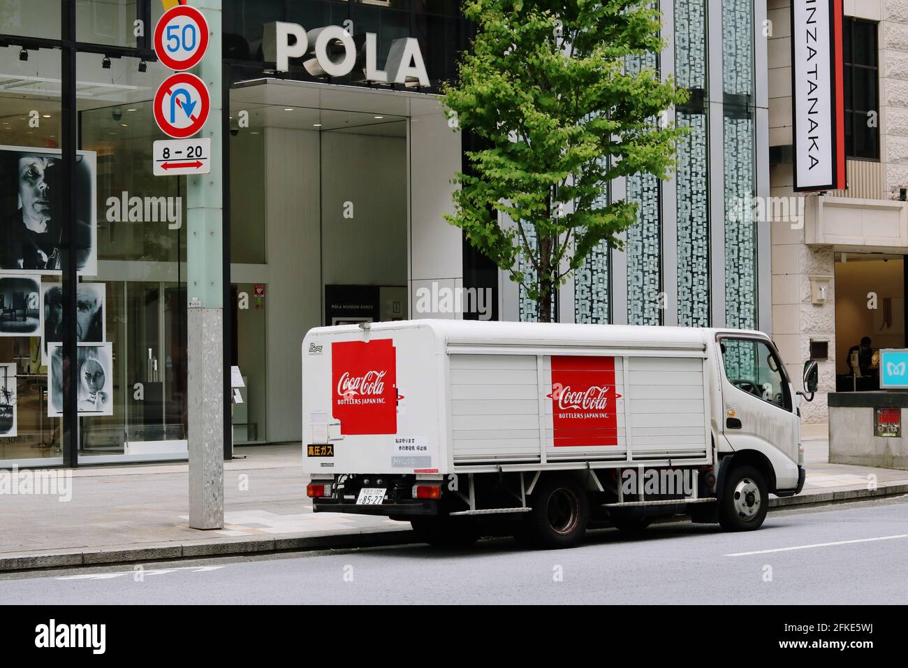 Drinks delivery truck with Coca Cola livery by Pola store (which houses ...