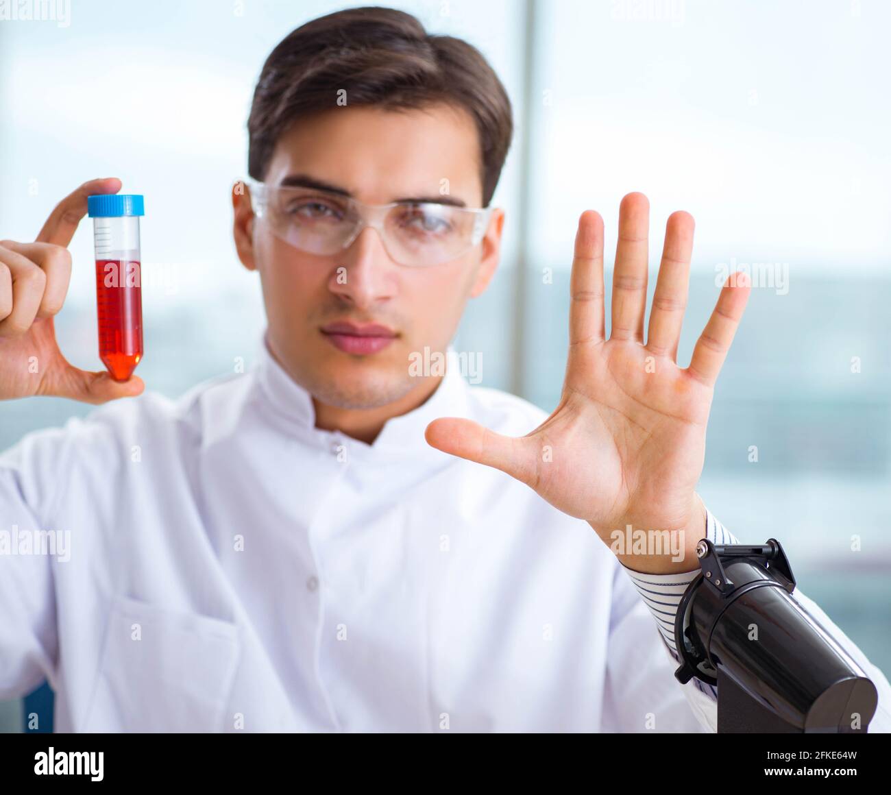 The man doctor checking blood samples in lab Stock Photo - Alamy
