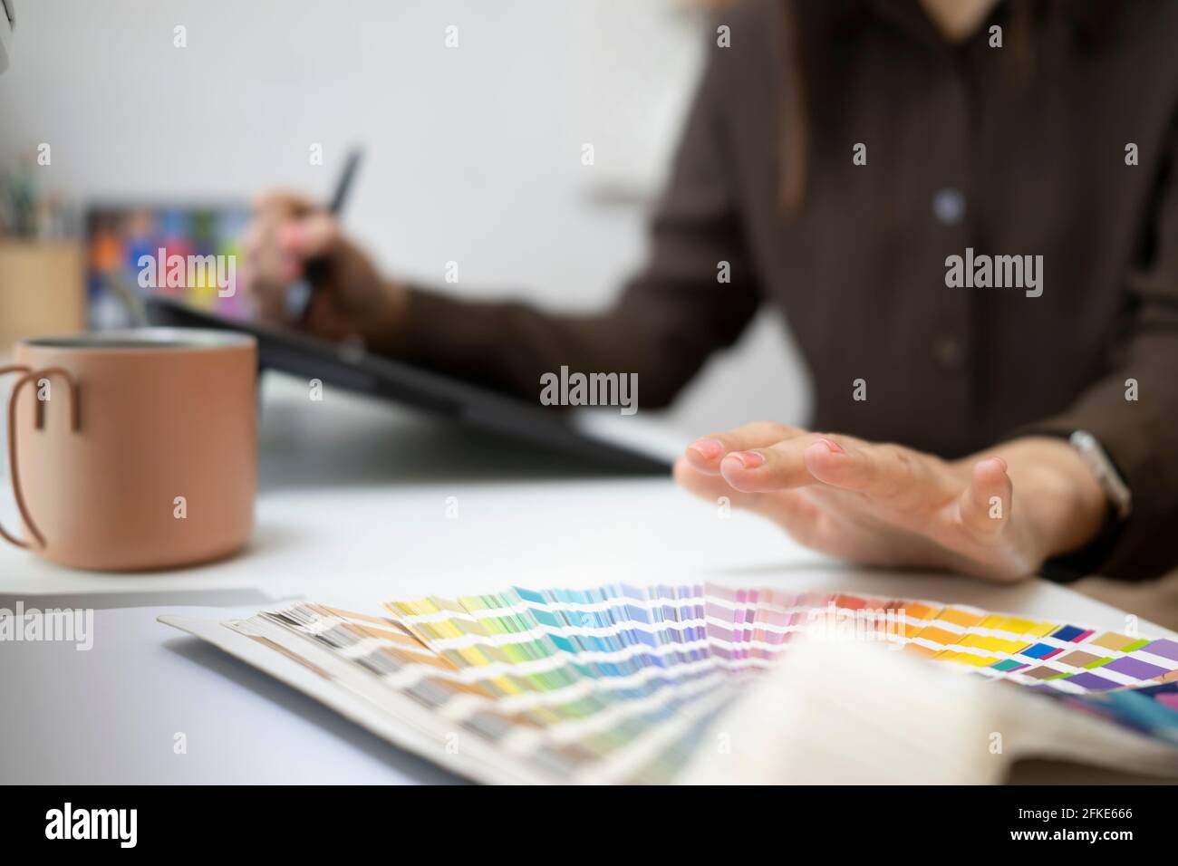 Female designer choosing colors hi-res stock photography and images - Alamy