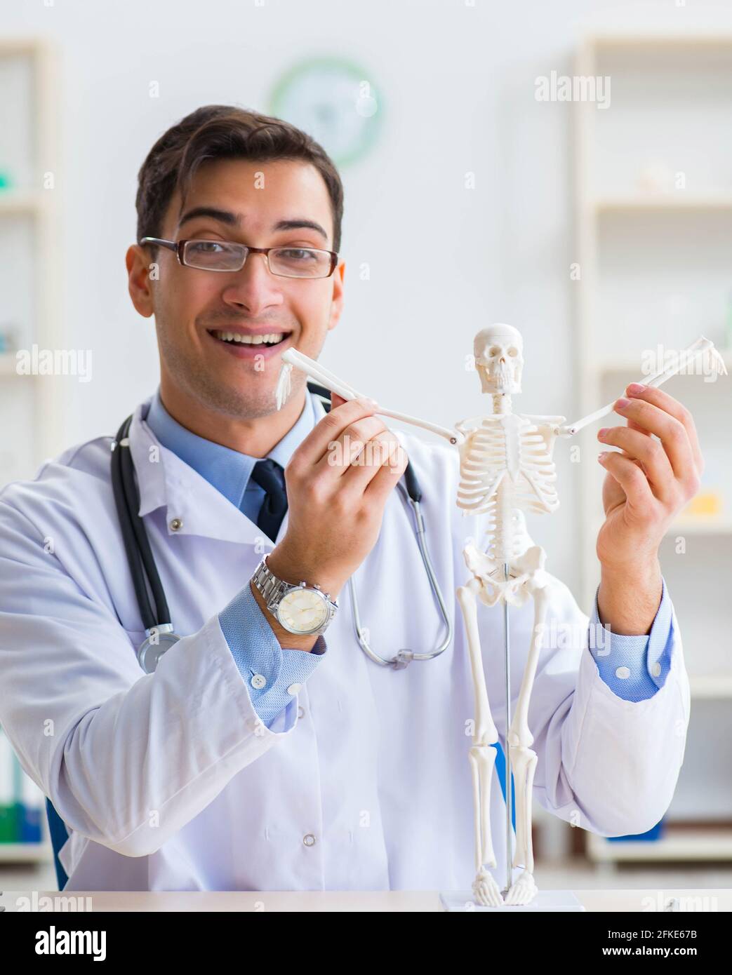 The doctor student studying the bones of skeleton Stock Photo - Alamy