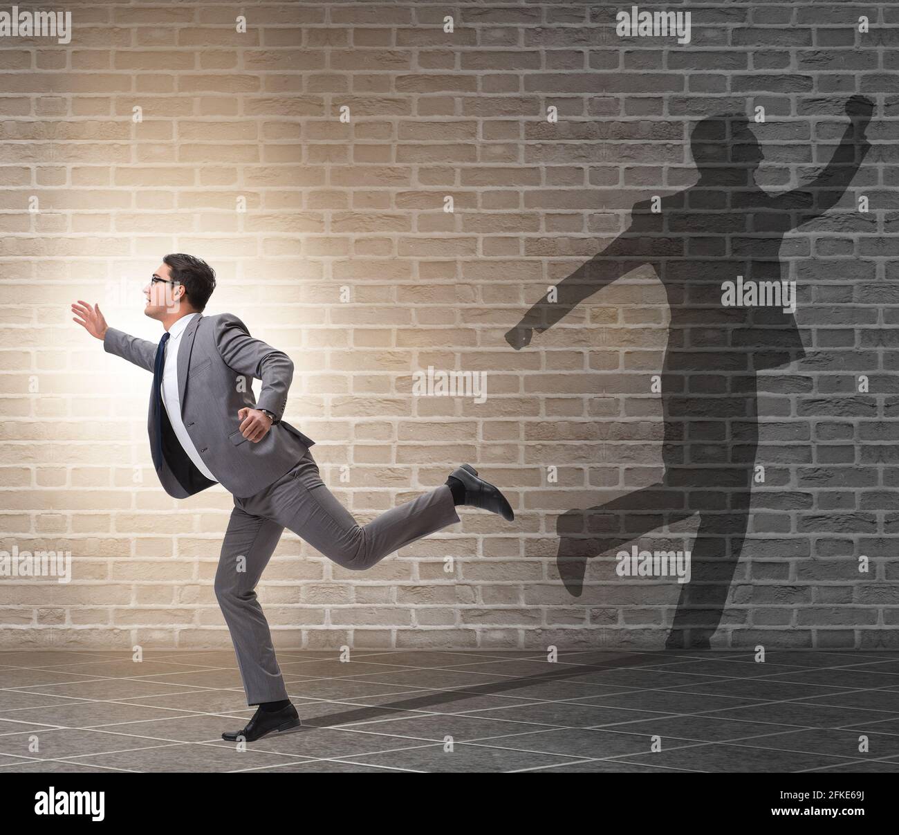 The businessman and his shadow in business concept Stock Photo - Alamy