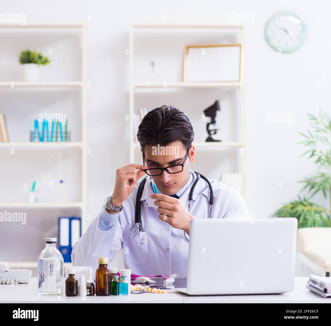 The doctor drug addict in the hospital Stock Photo - Alamy