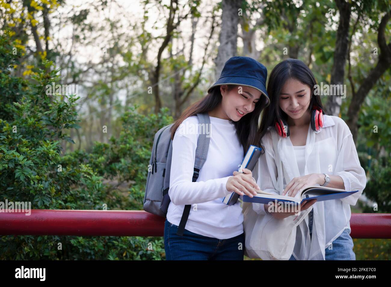 University students standing in the campus during break Stock Photo - Alamy