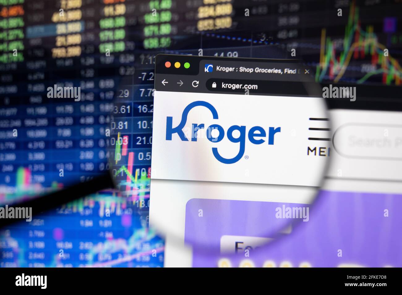 Kroger company logo on a website with blurry stock market developments ...