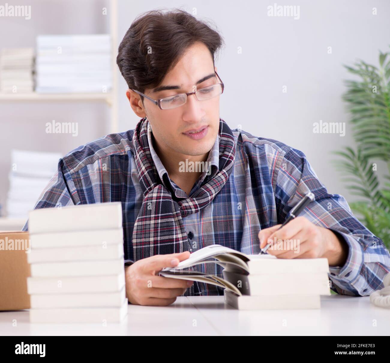 The writer presenting his books to public Stock Photo - Alamy